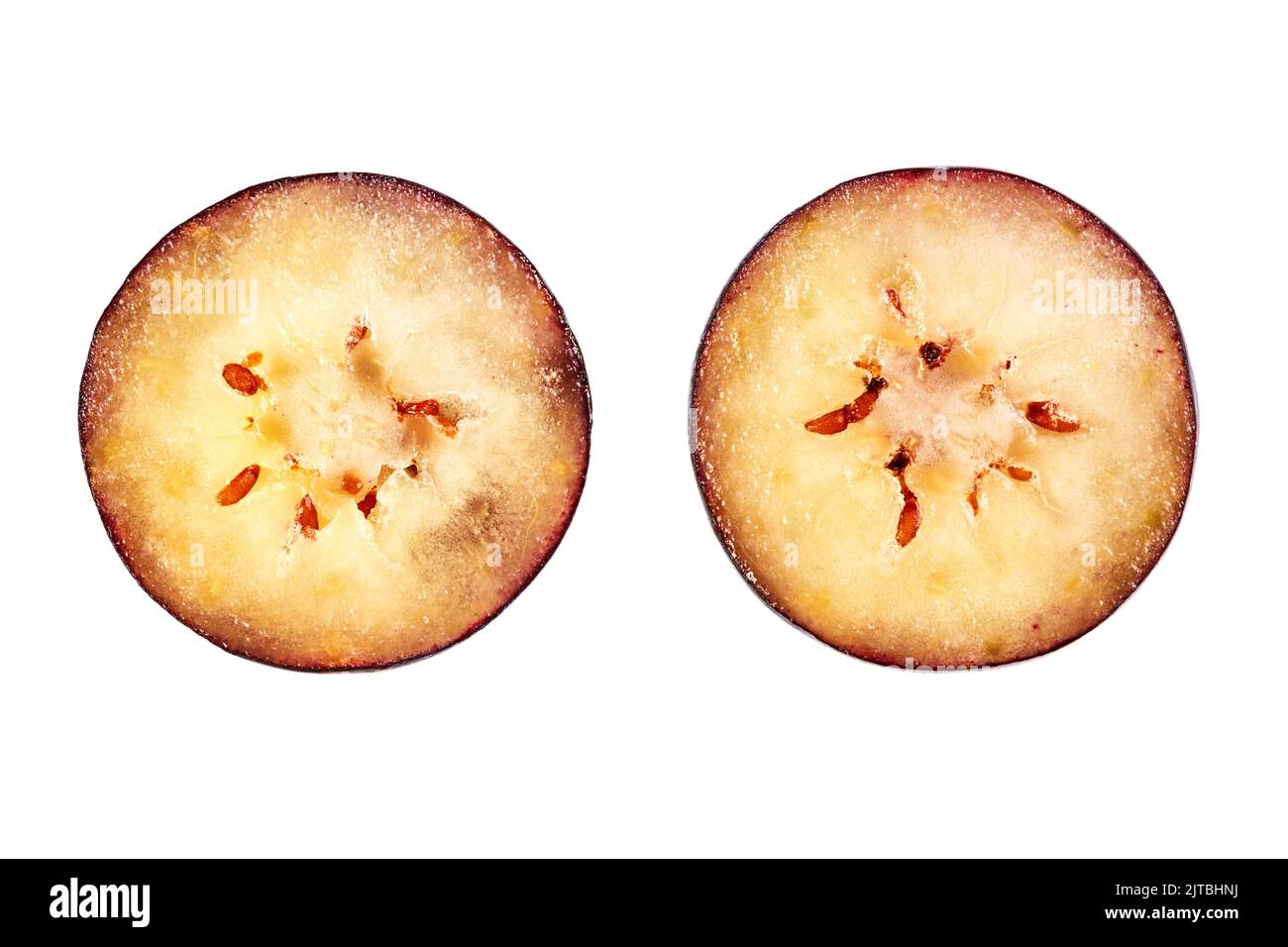 Close-up of Cut halves of blueberries isolated on white background ...