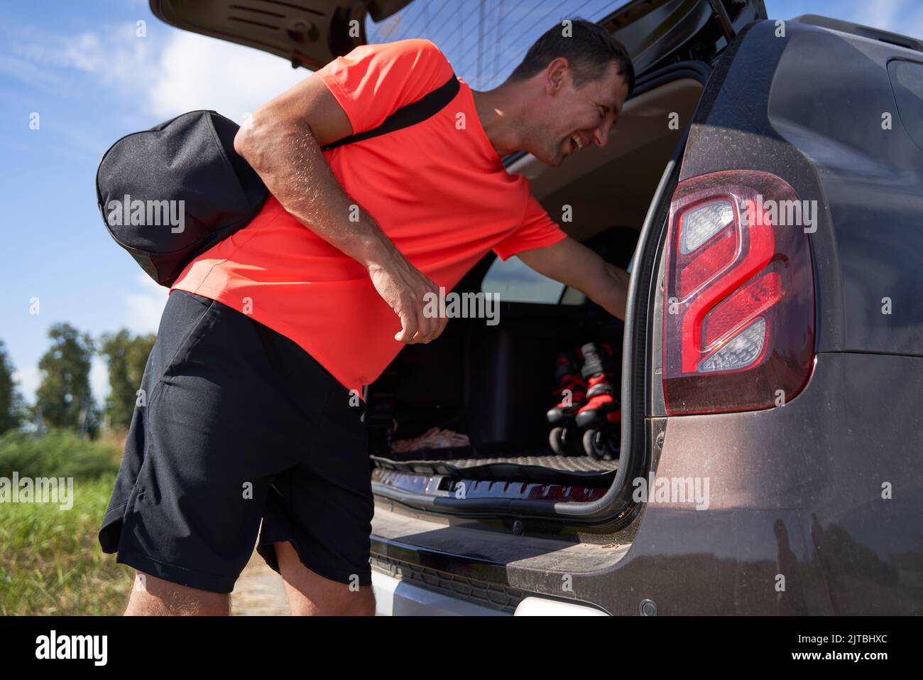 Athlete getting out of car hi-res stock photography and images - Alamy