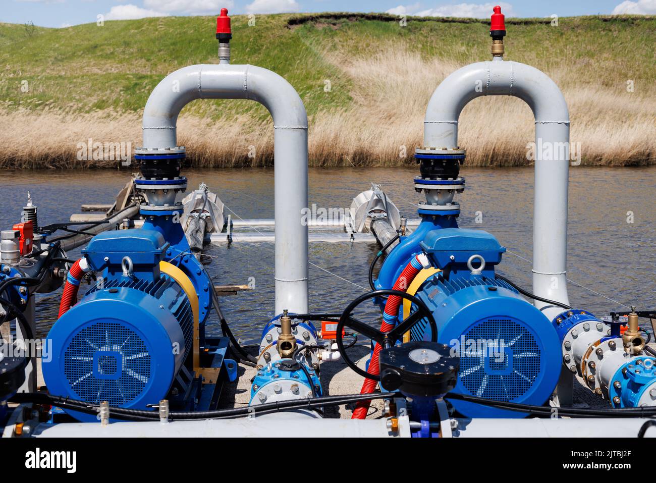 The pump pumps water from the river to irrigate agricultural fields ...