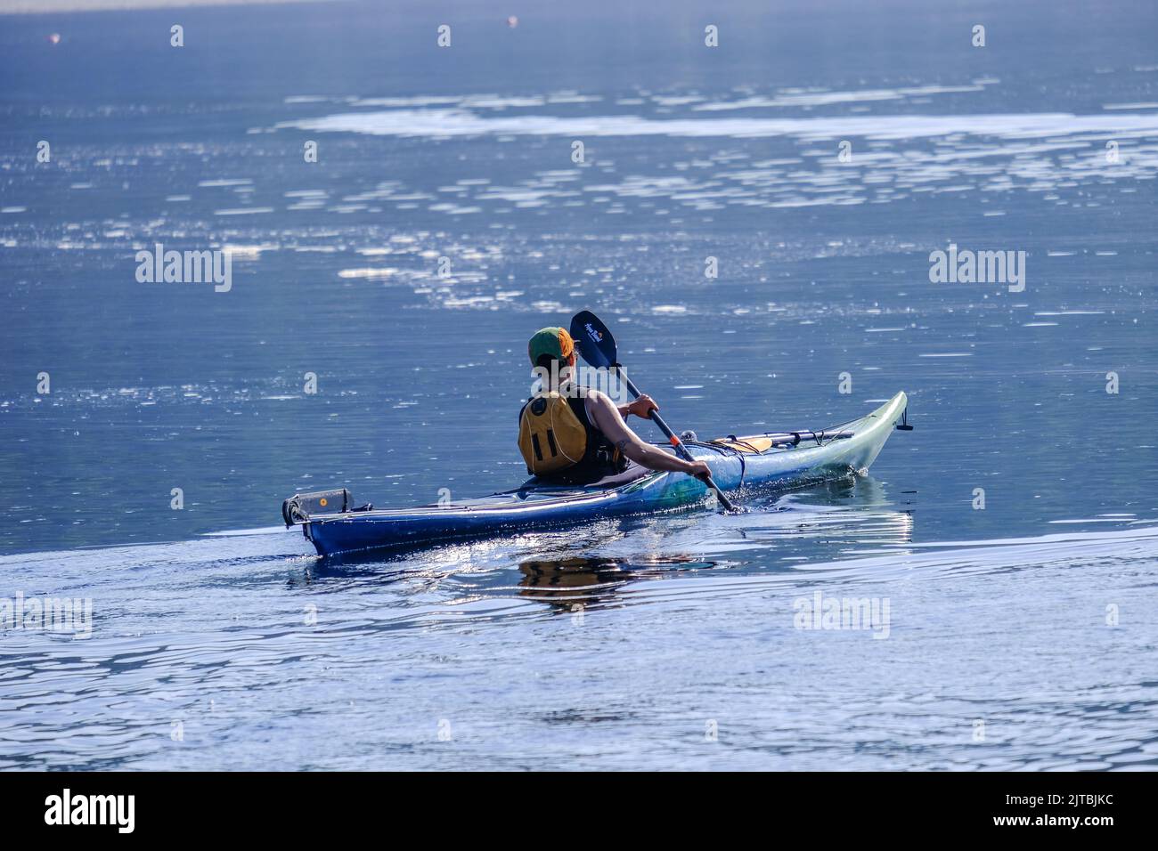 Sea kayaks heading out from harbor in Tadoussac, Quebec, Canada Stock ...