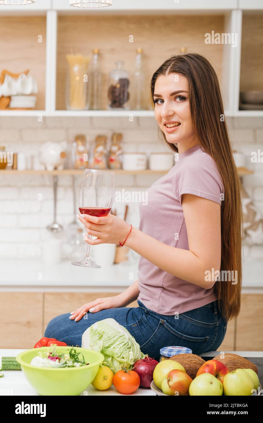 evening home alcohol relaxation female red wine Stock Photo - Alamy