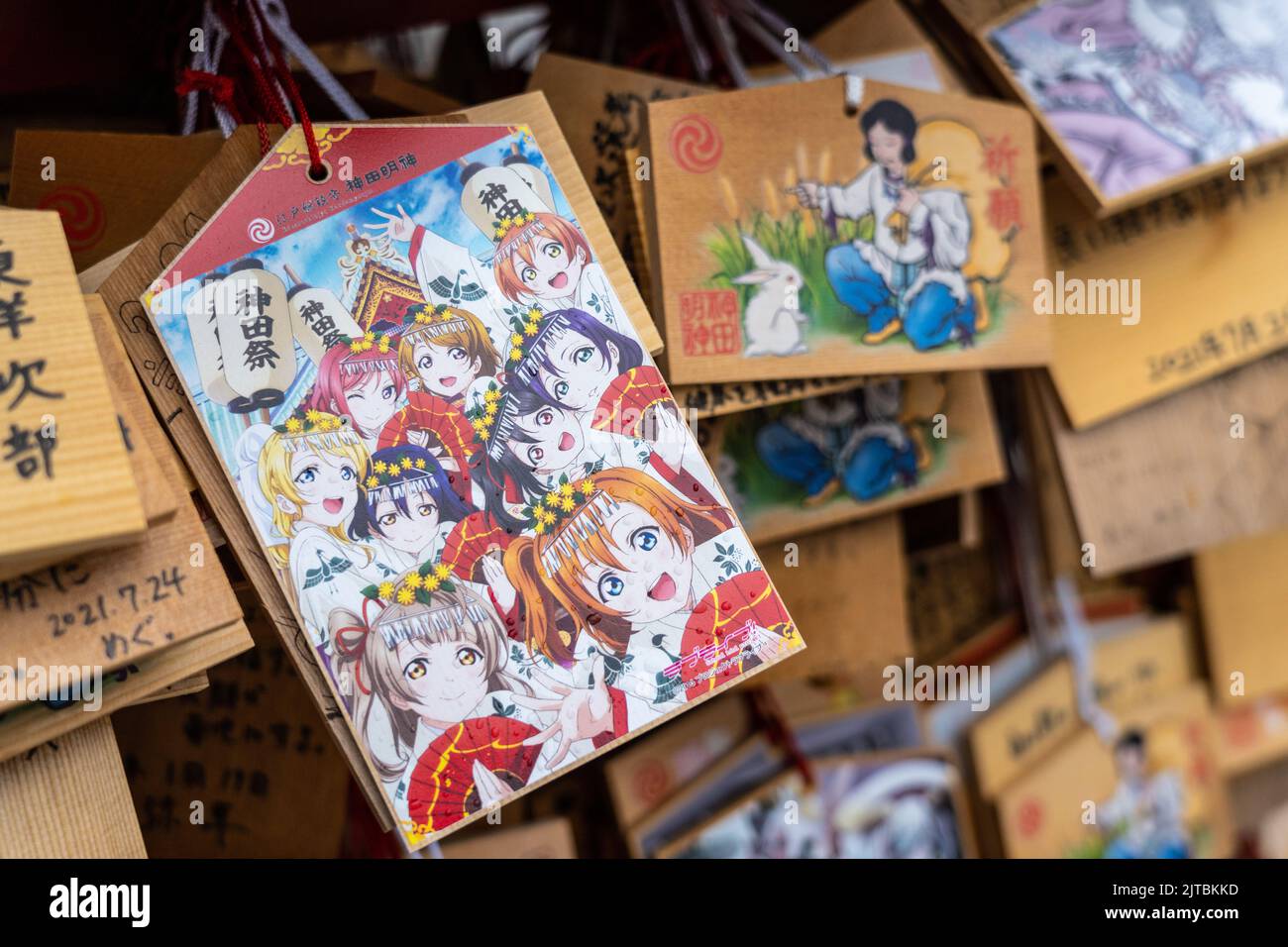 Japanese anime and manga characters painted on ema prayer plaques at ...