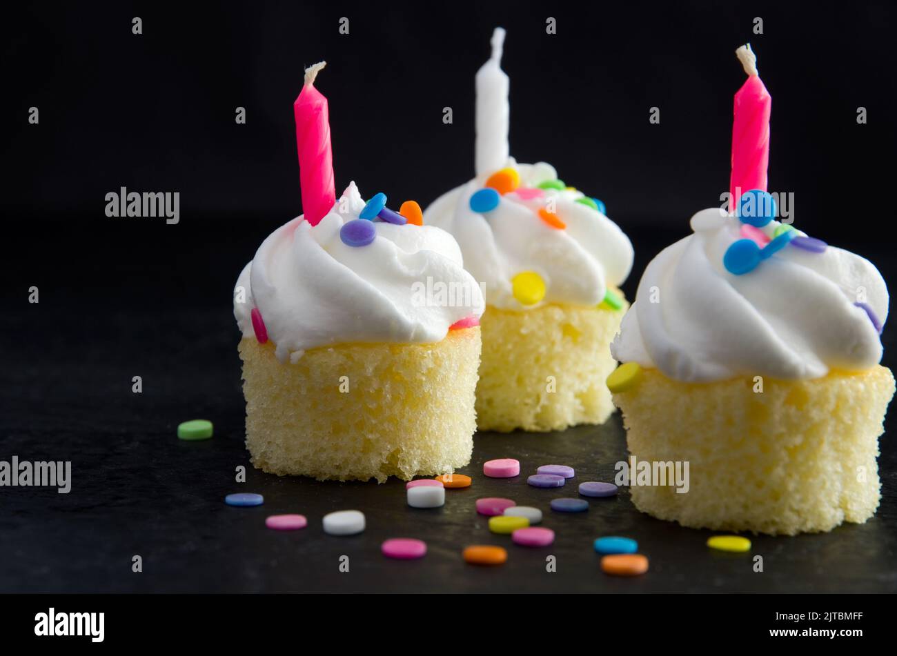 Delicious and Beautiful Mini Vanilla Muffins with Candles and Candies ...