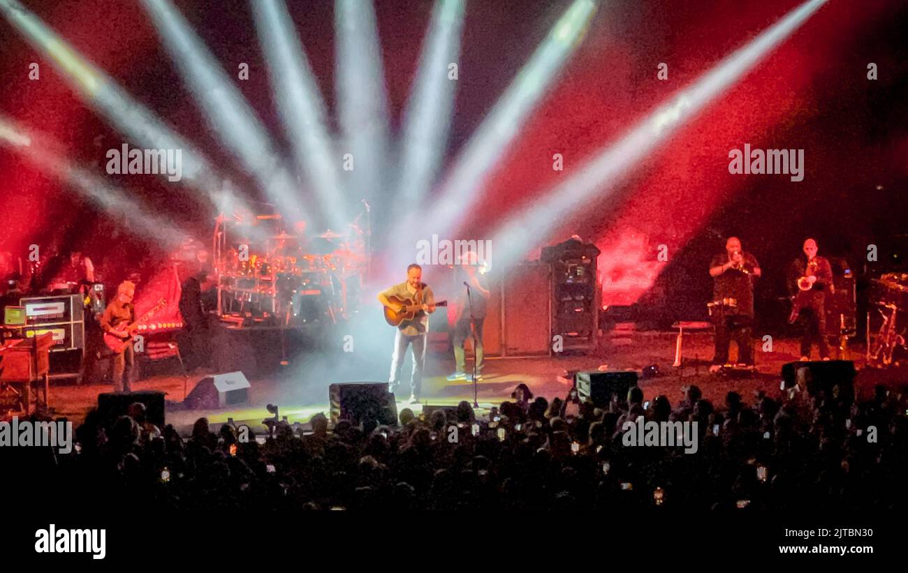 A scenic view of Dave Matthews band performing a live show on the stage ...