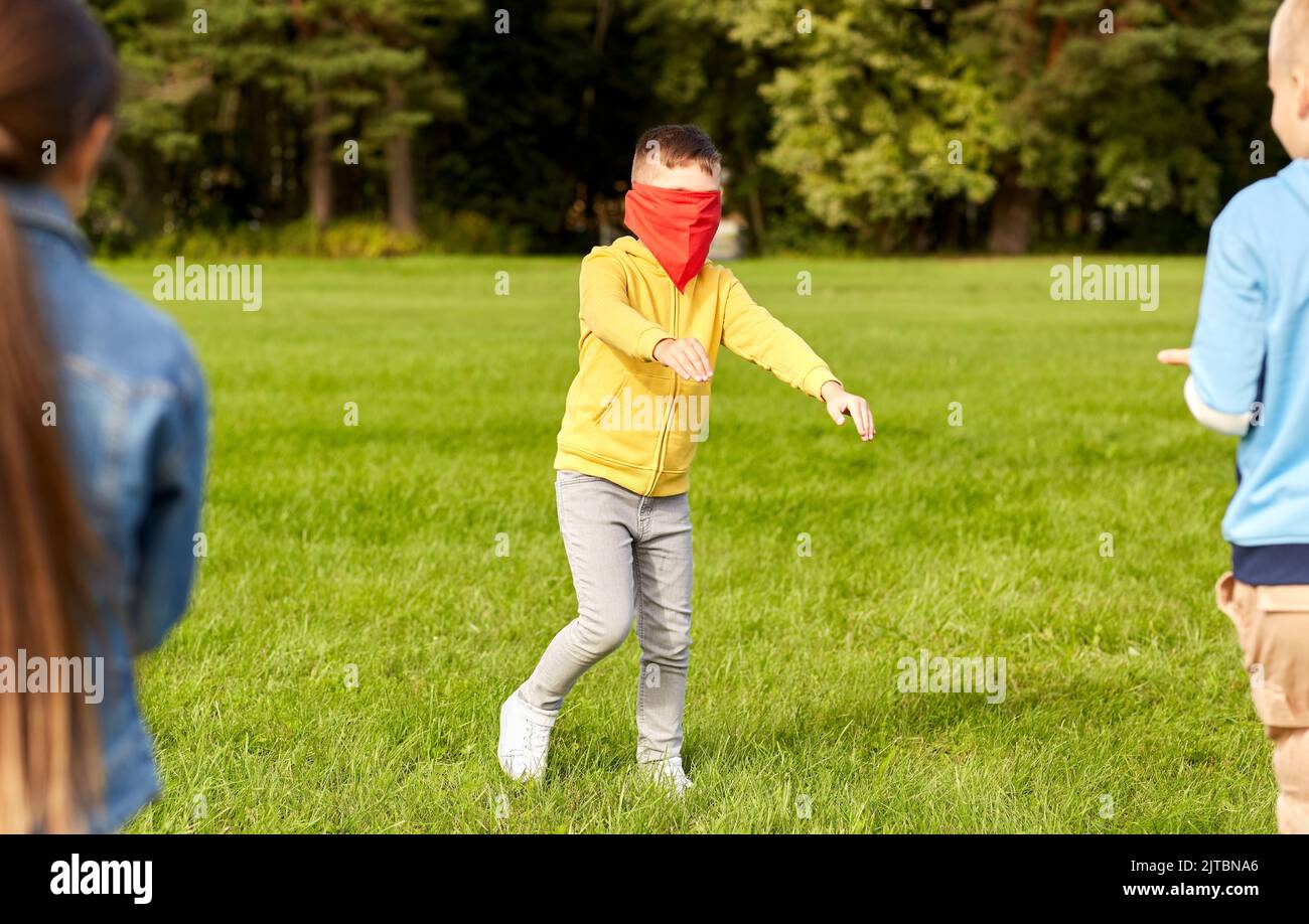 happy children playing and running at park Stock Photo - Alamy