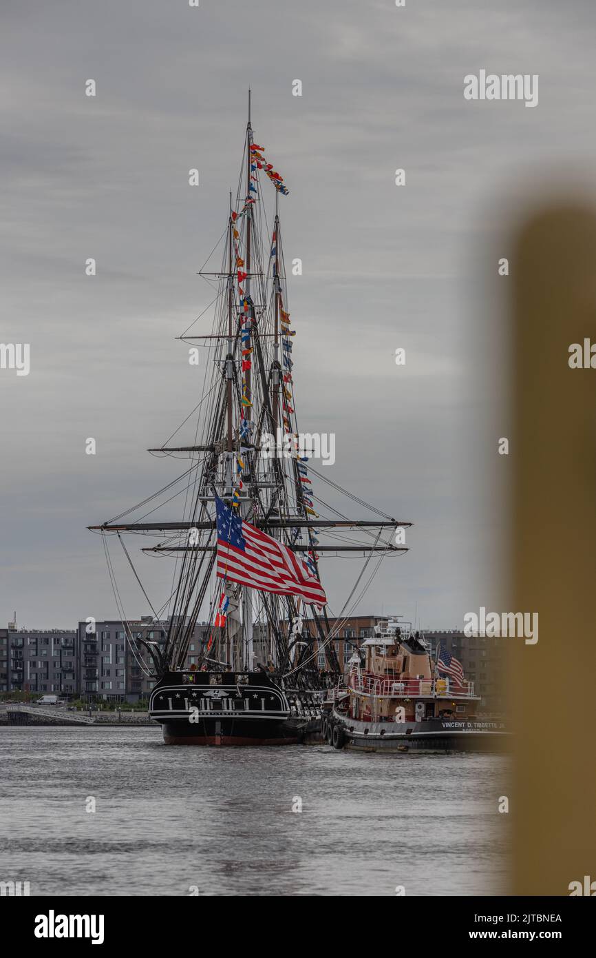 The oldest navy vessel USS Constitution moving through Boston harbor ...