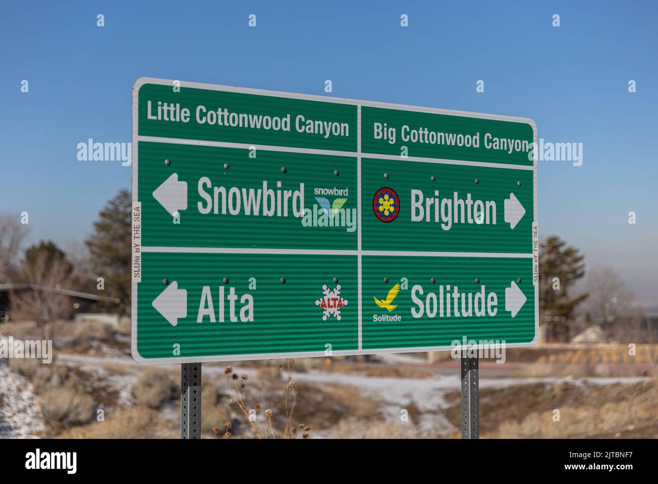 Huge road sign in mountains - showing the directions to little ... Huge road sign in mountains - showing the directions to little ...