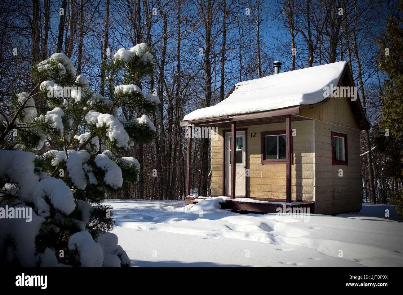 Small Rustic Cabin in Winter used for Personal Retreat Horizontal Stock ...