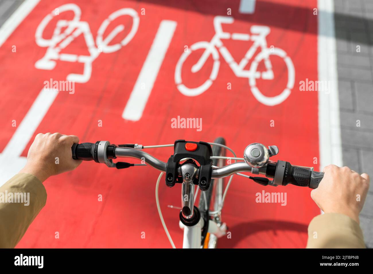 close up of bicycle's wheel on bike lane in city Stock Photo - Alamy