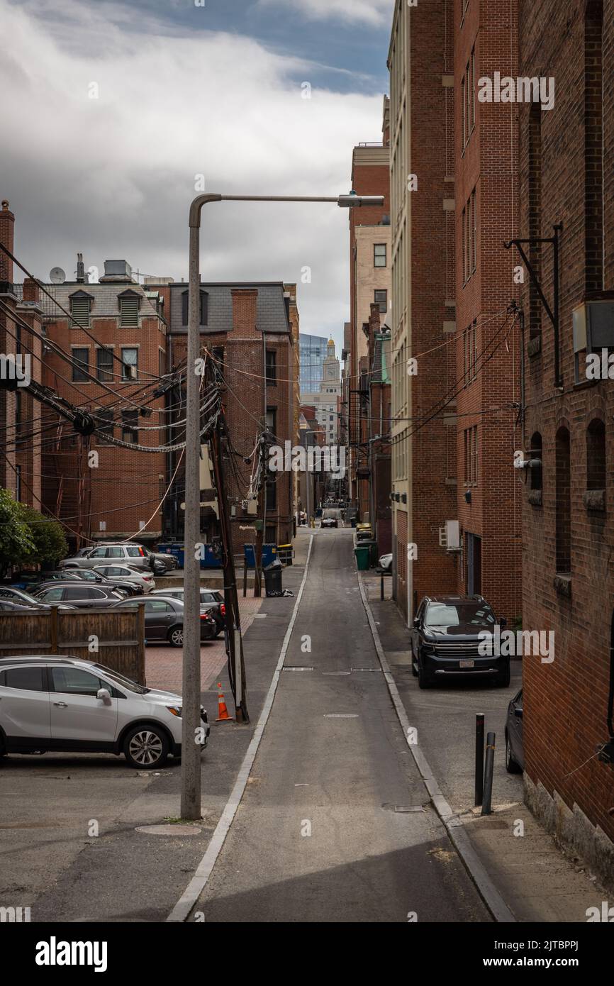 An alley in a Boston neighborhood with parking Stock Photo - Alamy