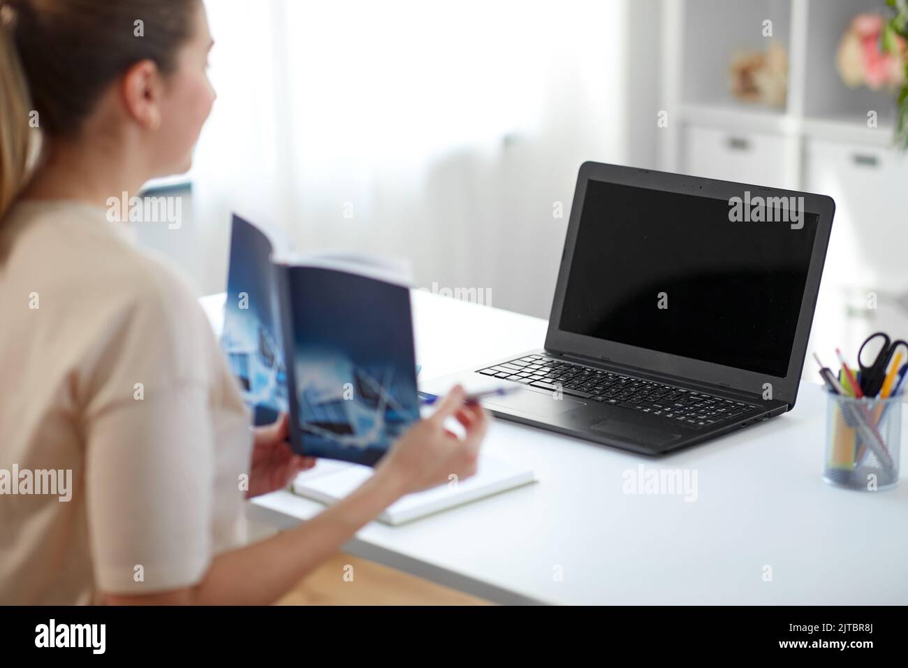 math teacher having online class at home Stock Photo - Alamy