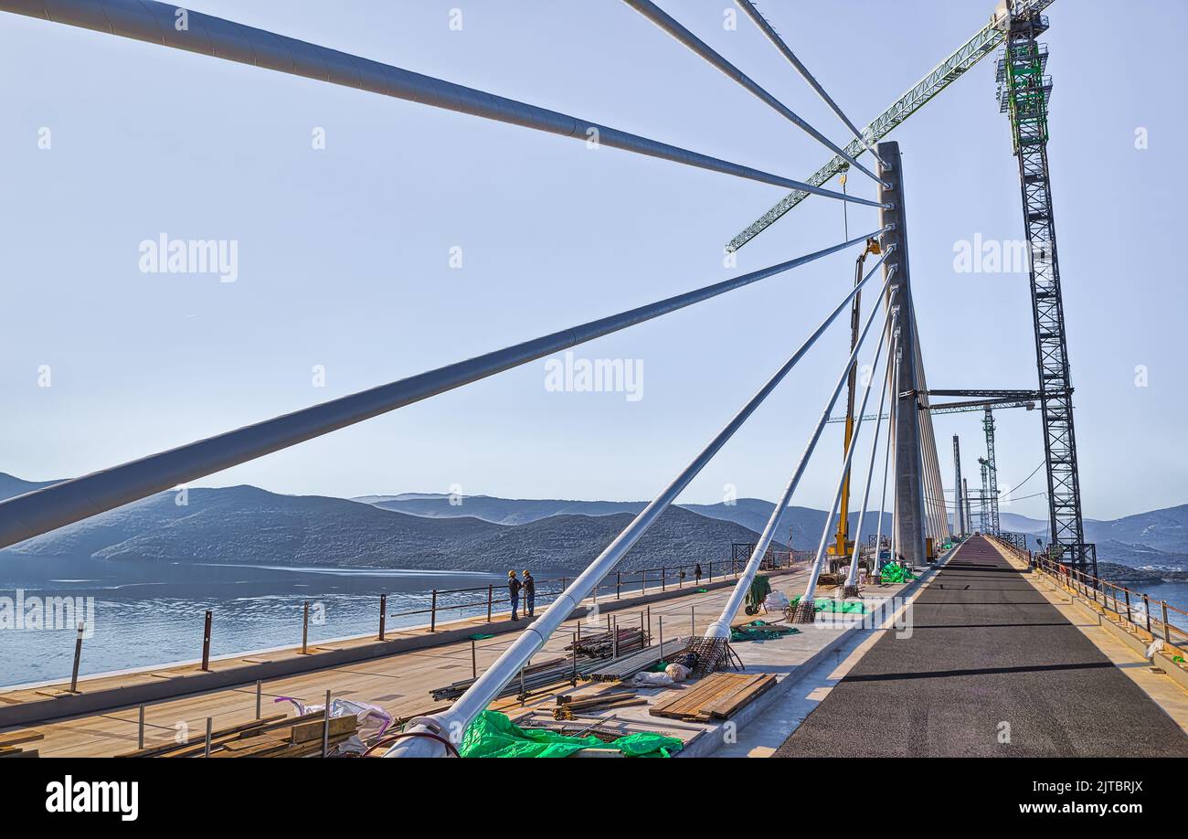 Asphalting of one traffic lane at the Peljesac bridge Stock Photo - Alamy