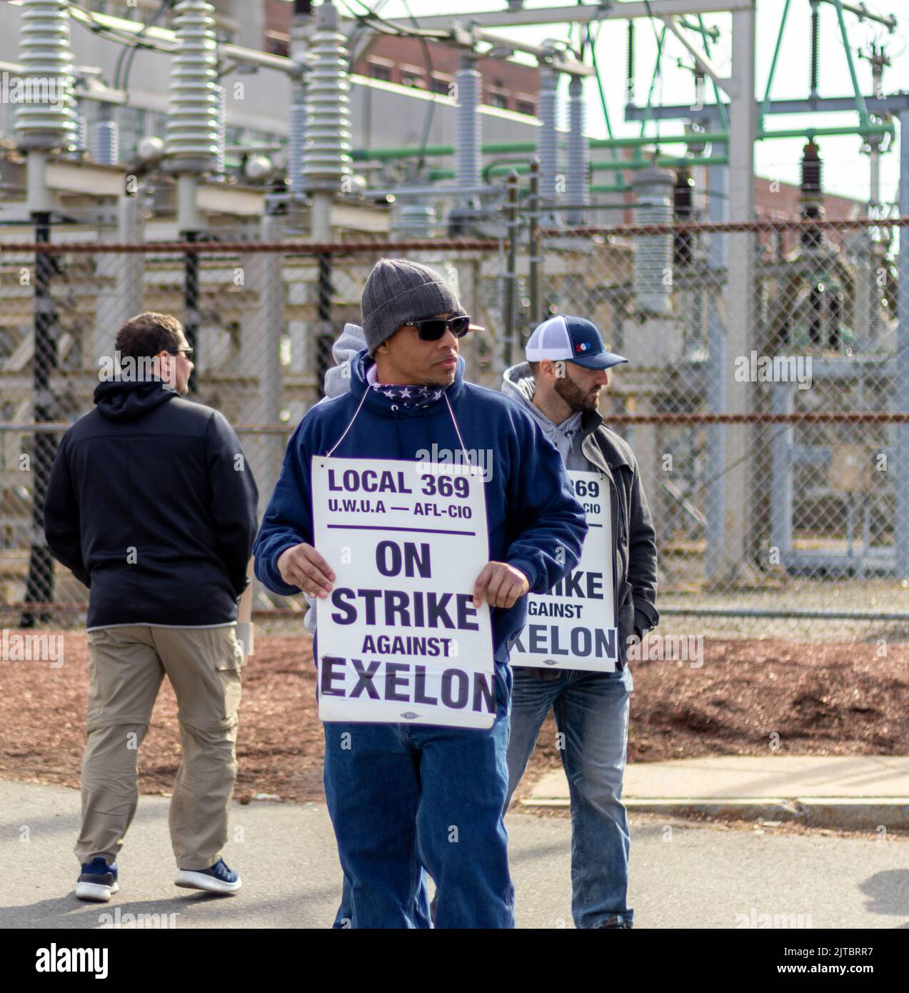 The workers in Boston walk the picket line during a worker's strike ...