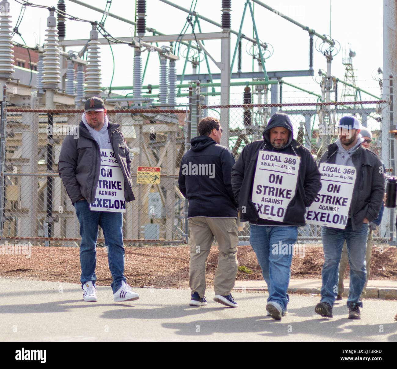 The workers in Boston walk the picket line during a worker's strike ...