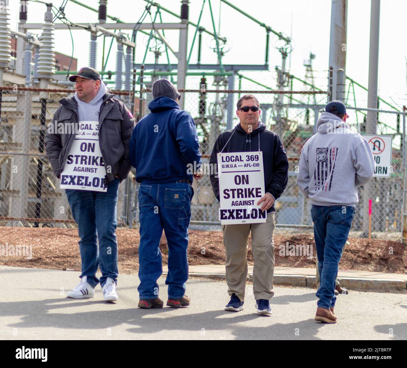 The workers in Boston walk the picket line during a worker's strike ...