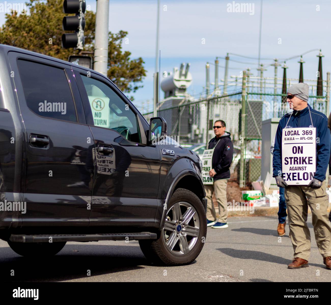 The workers in Boston walk the picket line during a worker's strike ...