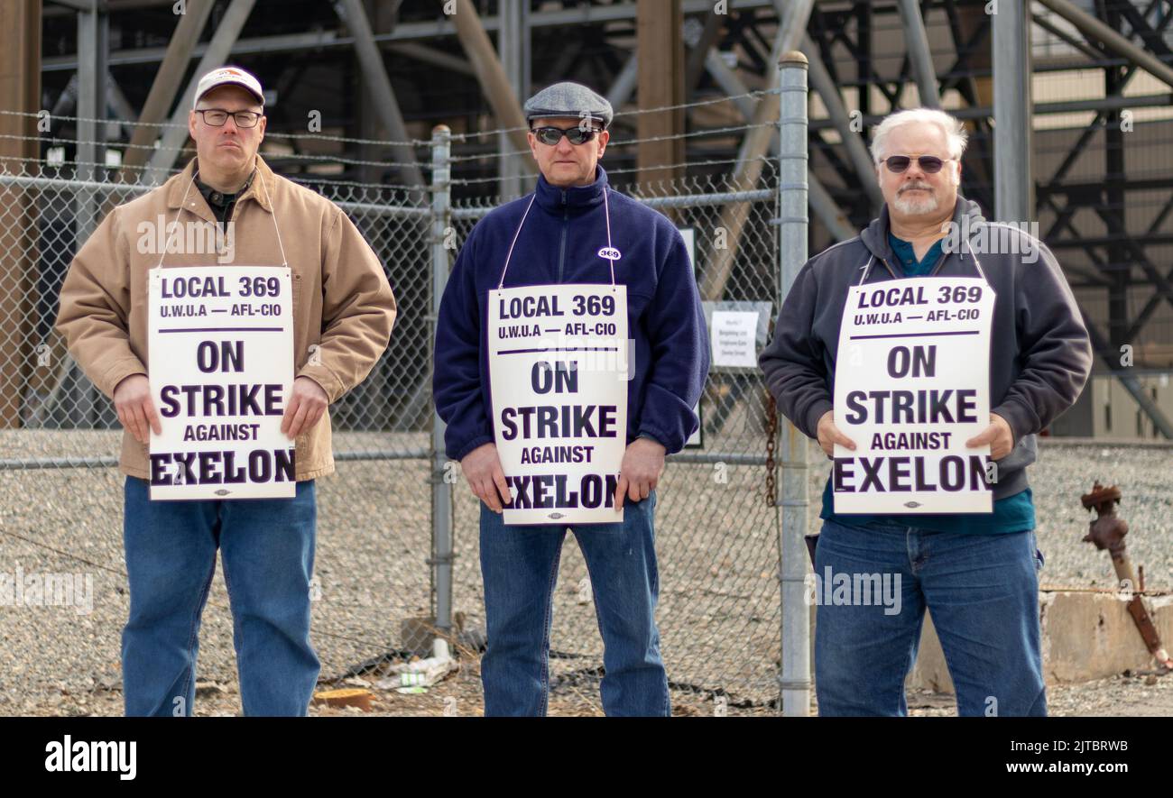 The workers in Boston walk the picket line during a worker's strike ...