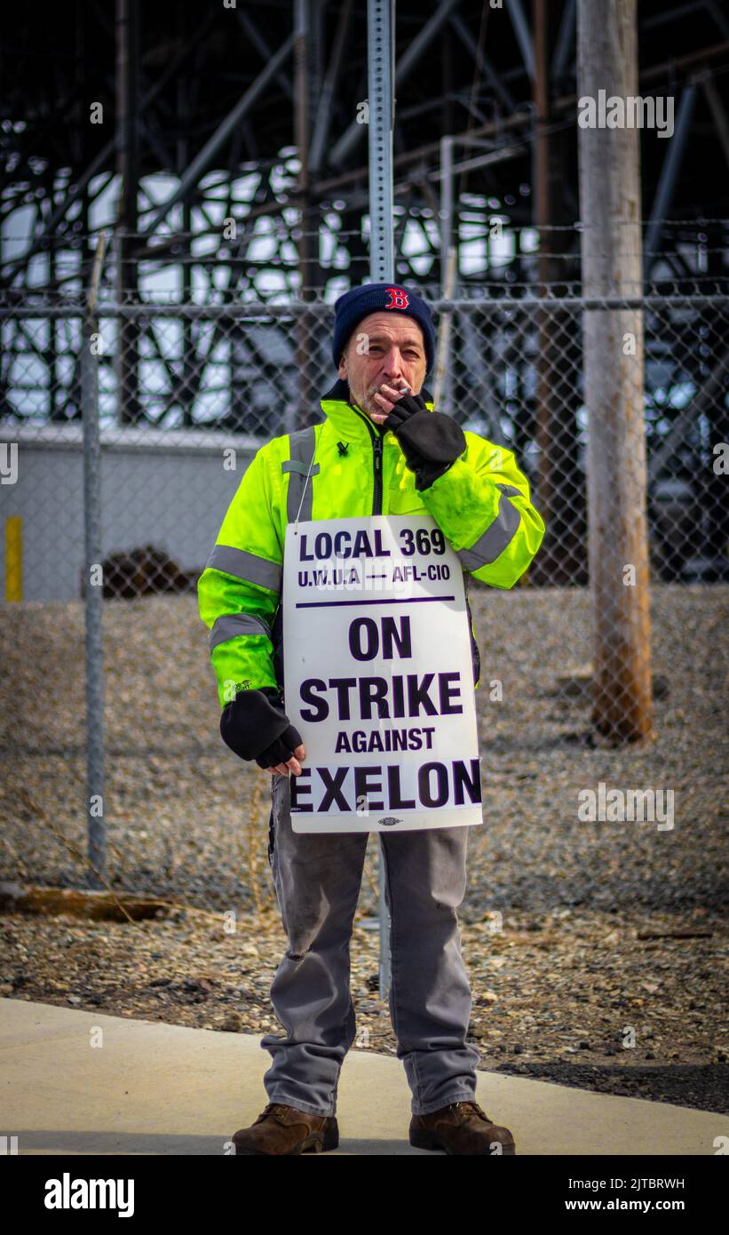 The workers in Boston walk the picket line during a worker's strike ...