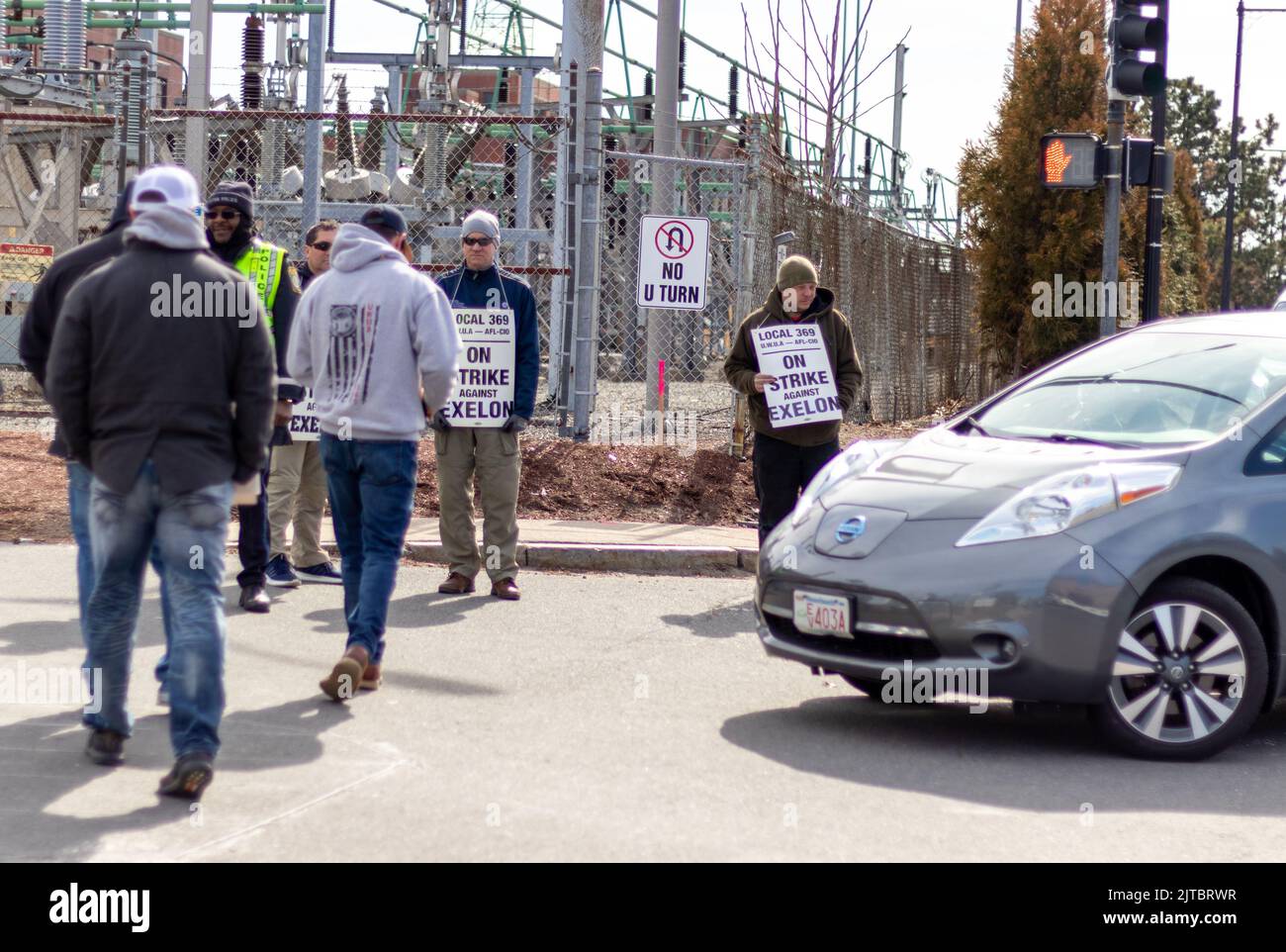 The workers in Boston walk the picket line during a worker's strike ...