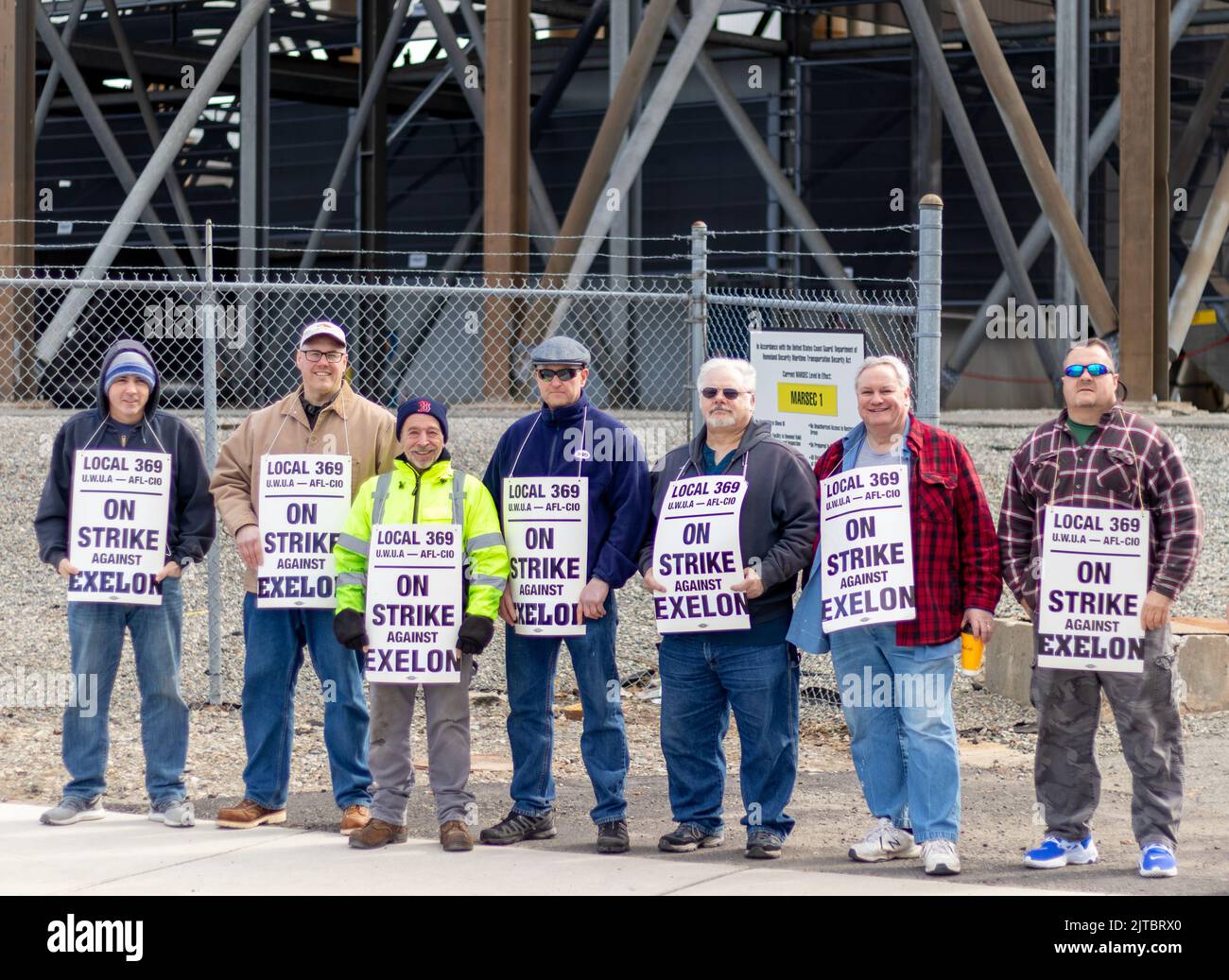 The workers in Boston walk the picket line during a worker's strike ...