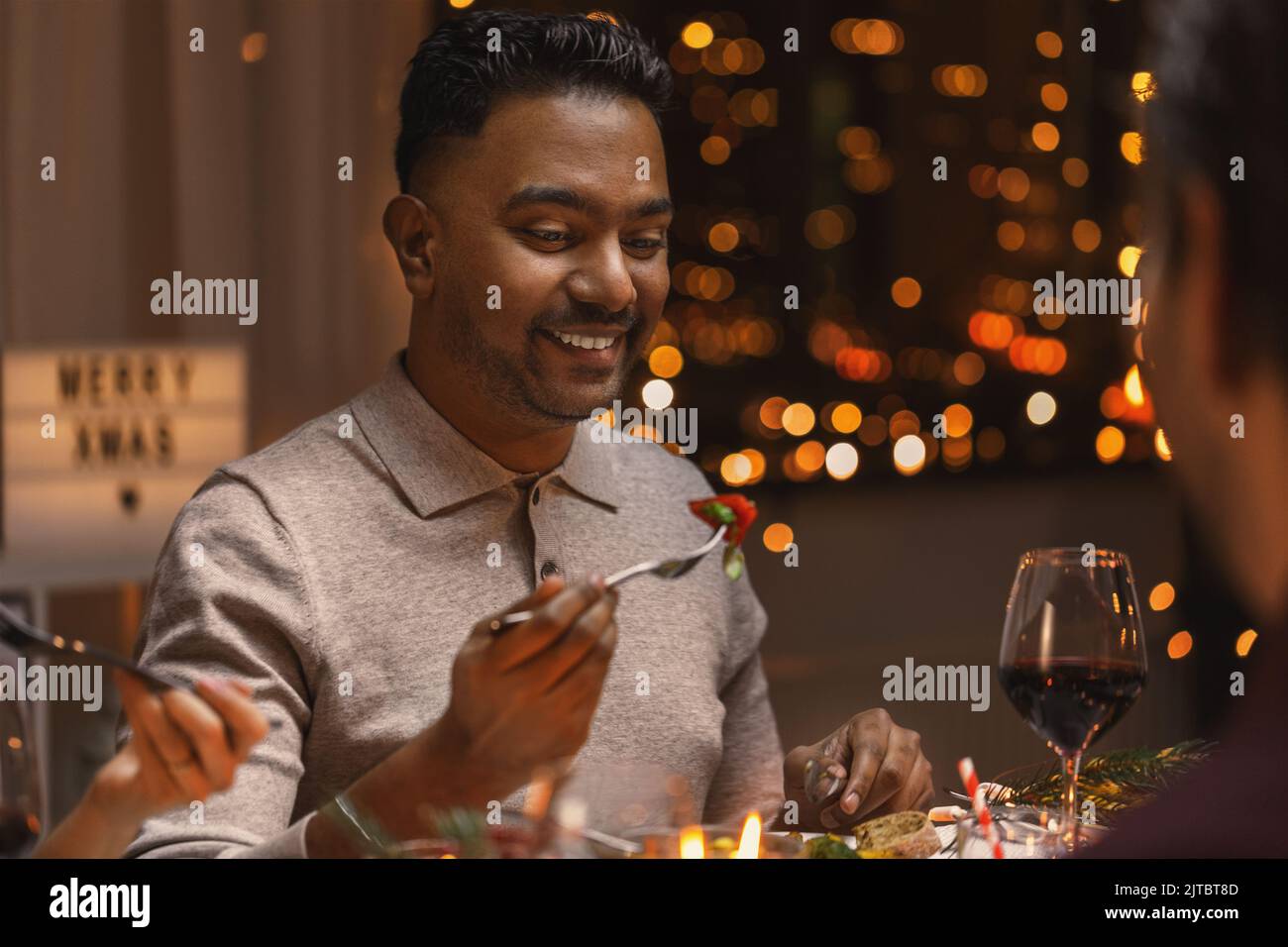 Indian family having dinner hi-res stock photography and images - Alamy