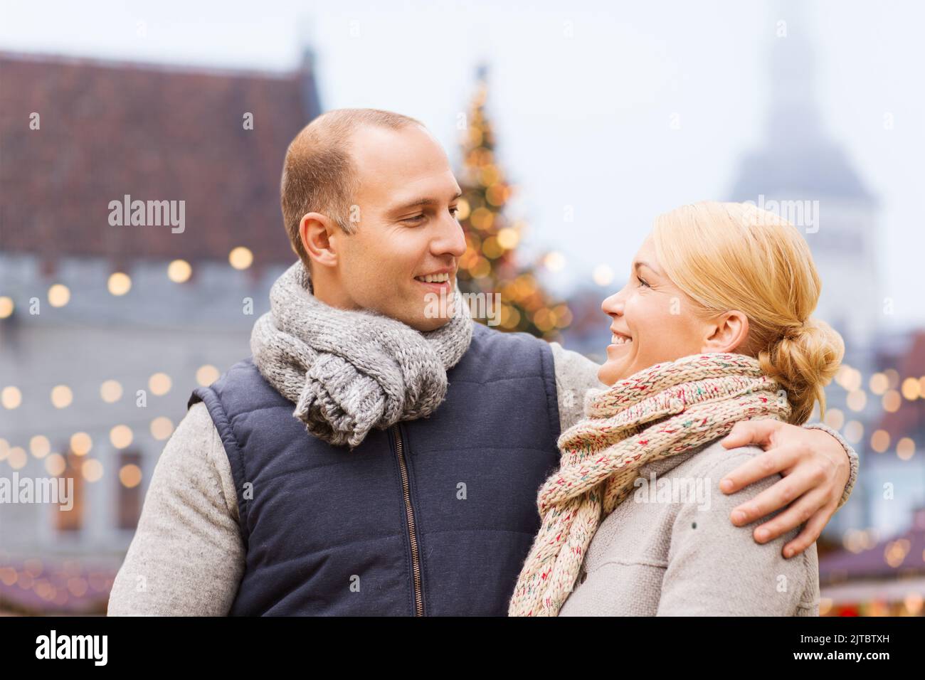 Young happy couple talking hugging hi-res stock photography and images ...