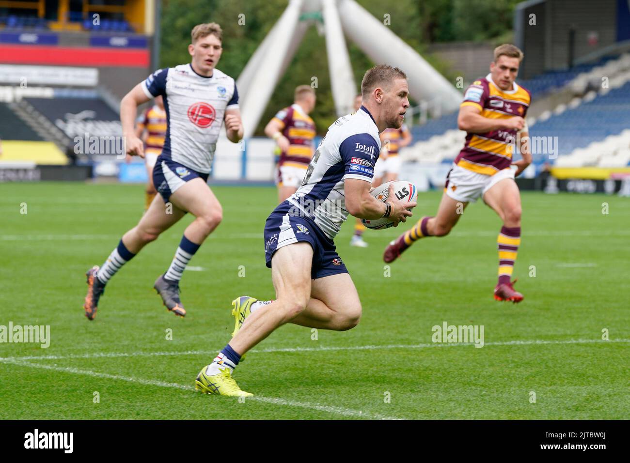 Matt Dufty #36 of Warrington Wolves runs in a try Stock Photo - Alamy