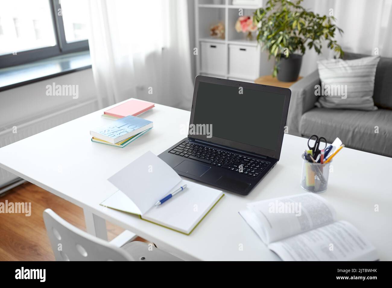 Open book laptop pen hi-res stock photography and images - Alamy