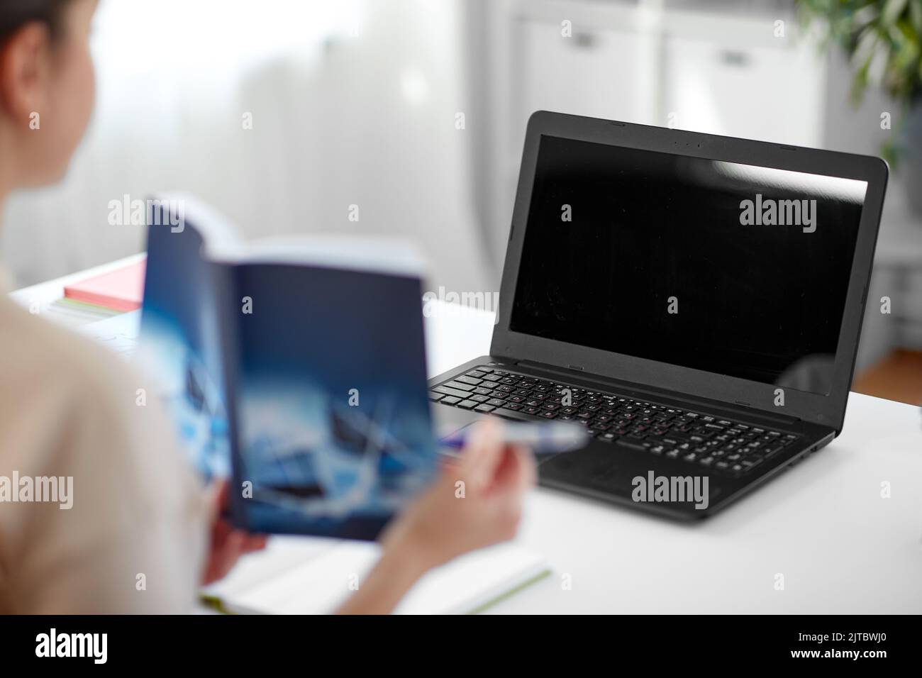 math teacher having online class at home Stock Photo - Alamy