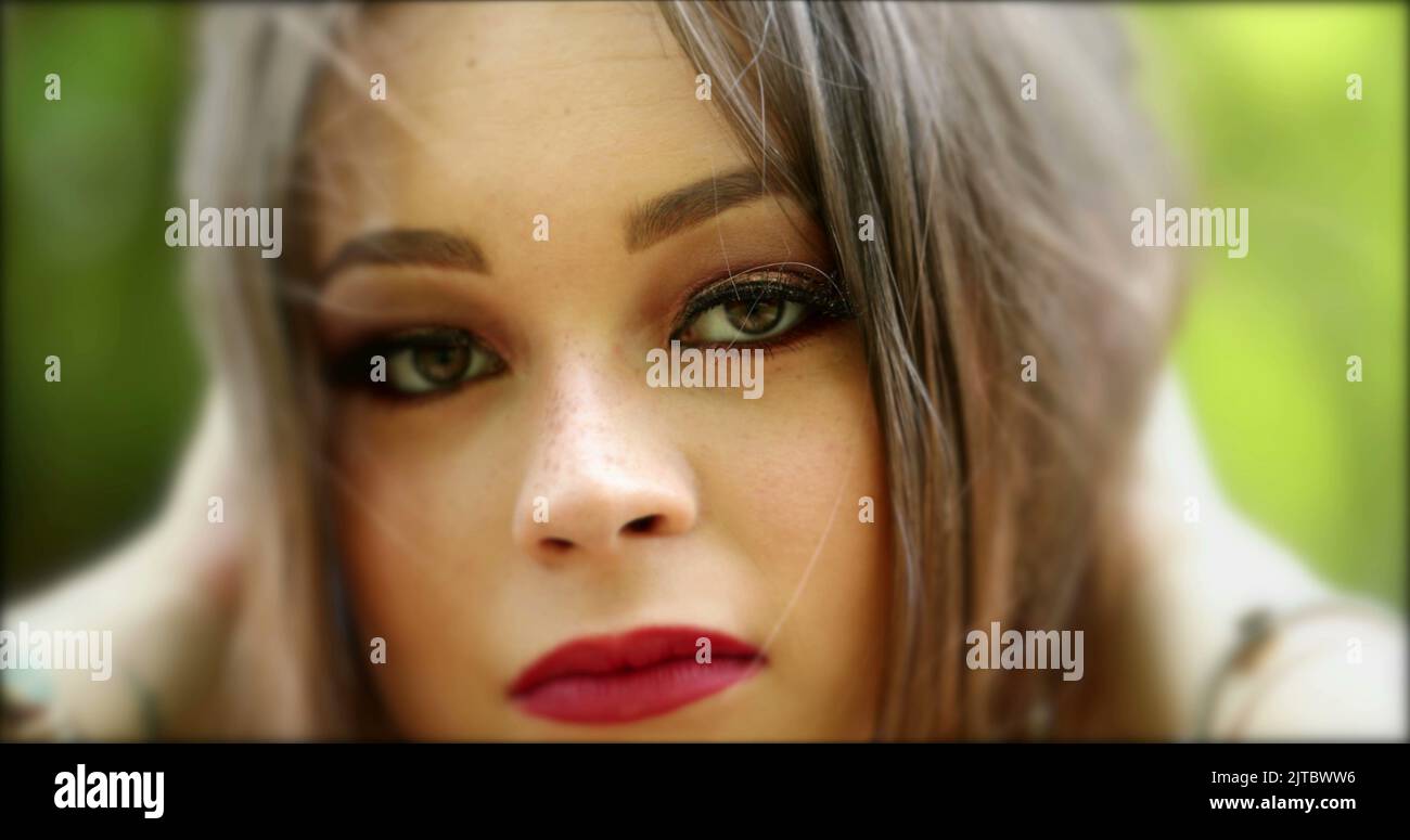 Millennial girl face portrait looking to camera. Young woman in 20s ...