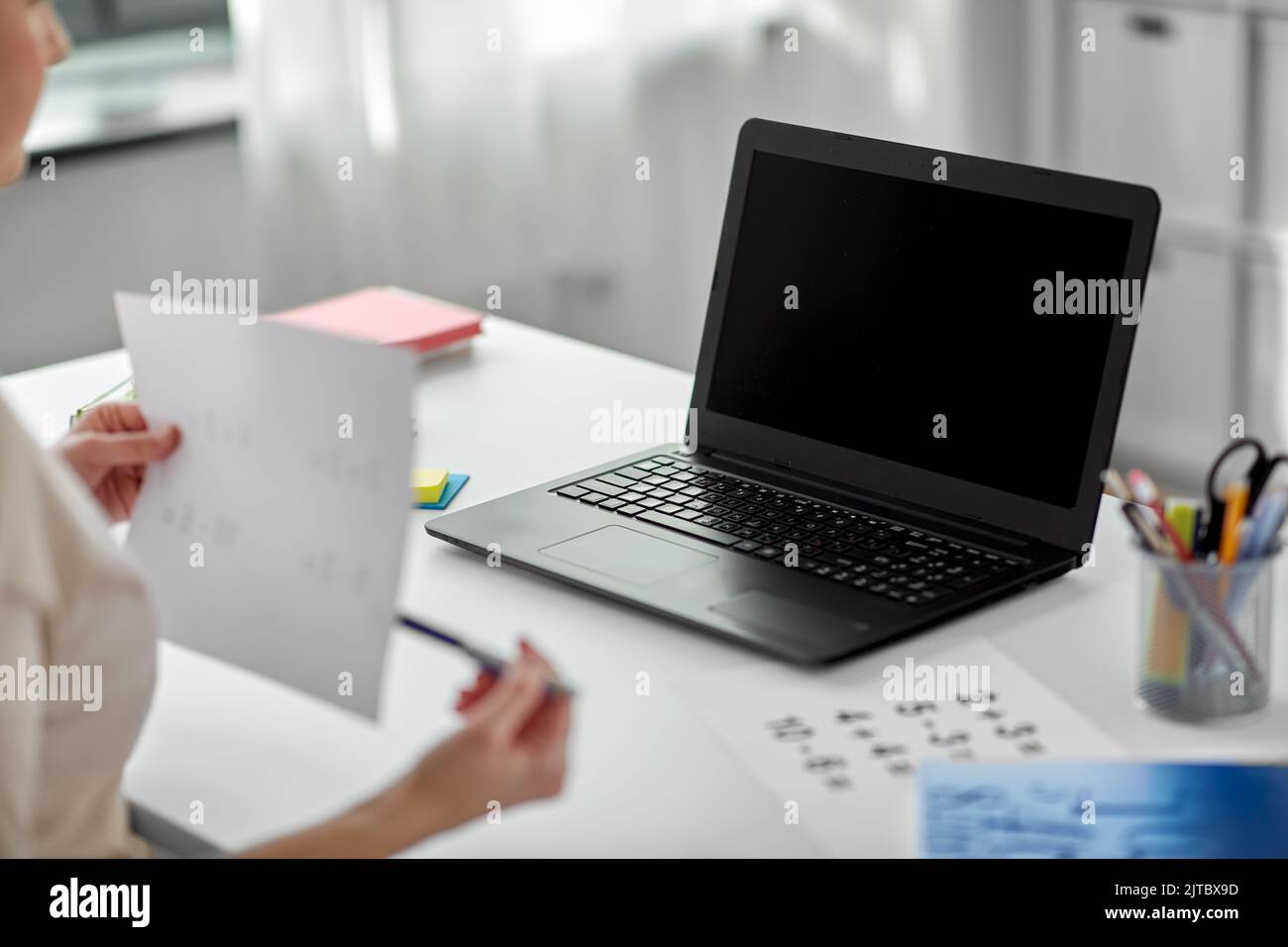 math teacher having online class at home Stock Photo - Alamy