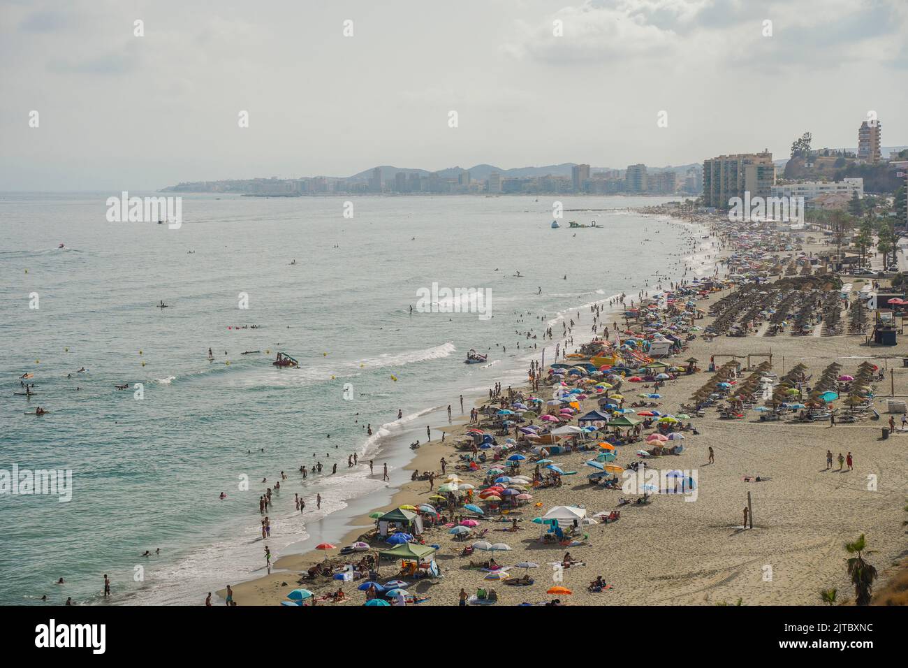 Crowded beach with parasols busy beach, Fuengirola, Los Boliches ...