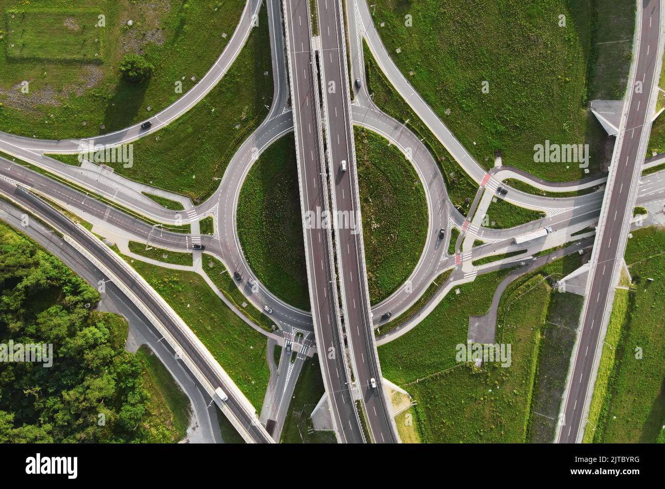 Top view of cars driving on round intersection in city, Transportation ...