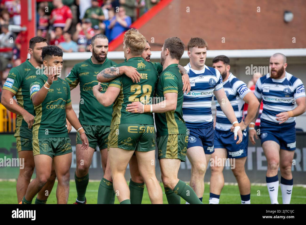 Will Tate #28 of Hull KR celebrates his try and makes the score 4-0 ...