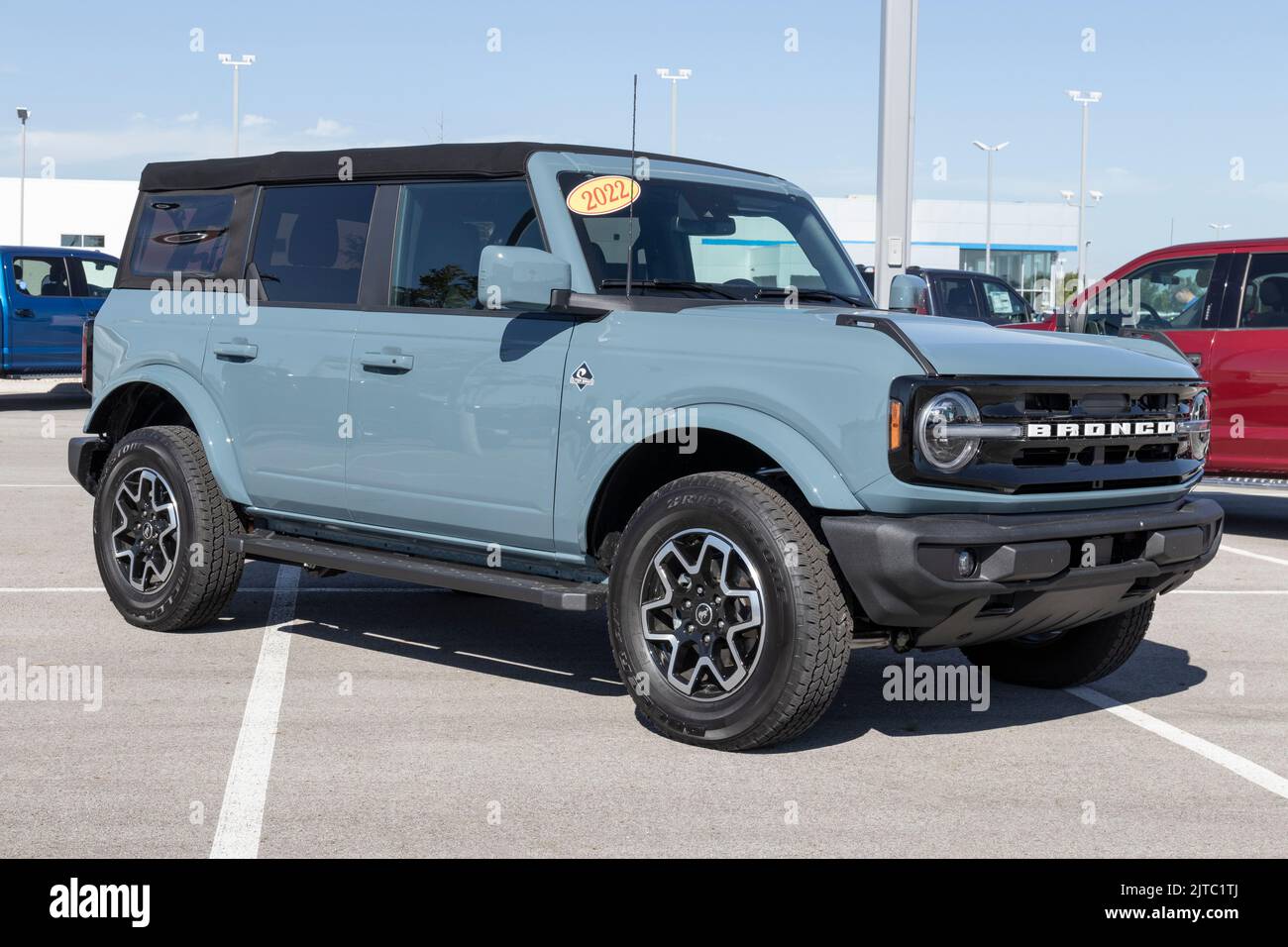 Muncie - Circa August 2022: Ford Bronco display. Broncos are offered in ...