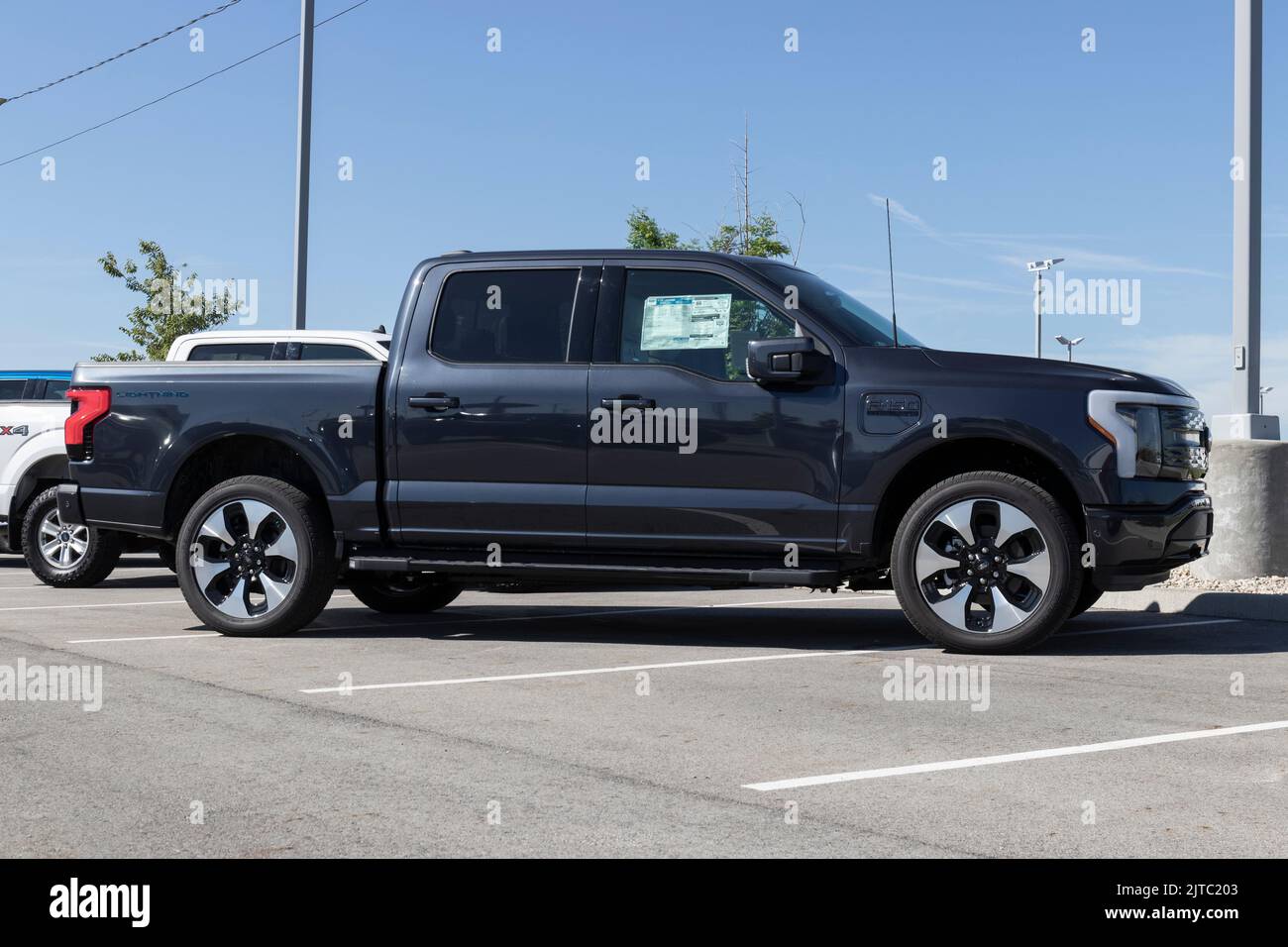 Muncie - Circa August 2022: Ford F-150 Lightning display. Ford offers ...