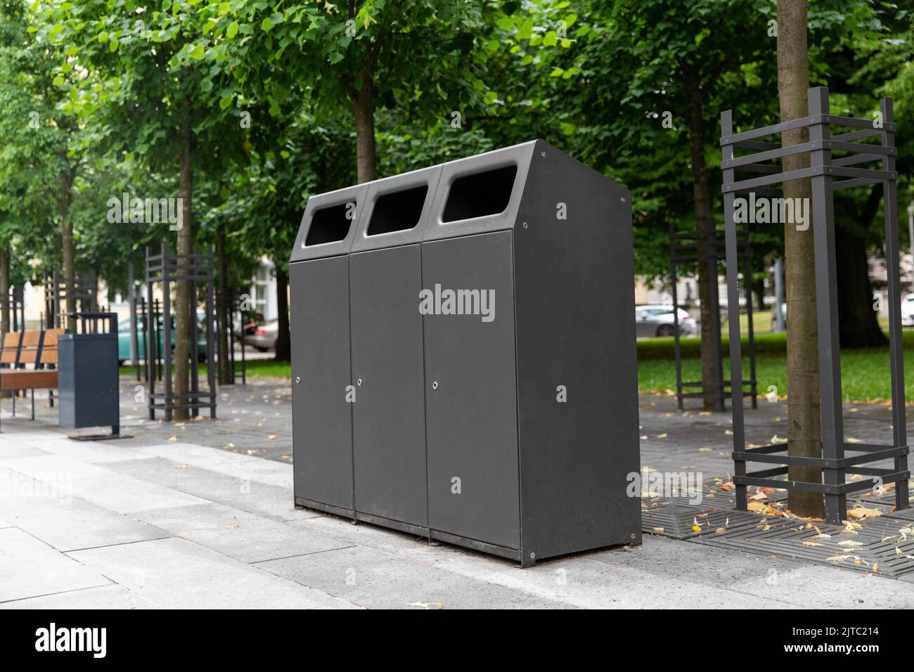 trash container on city street Stock Photo - Alamy