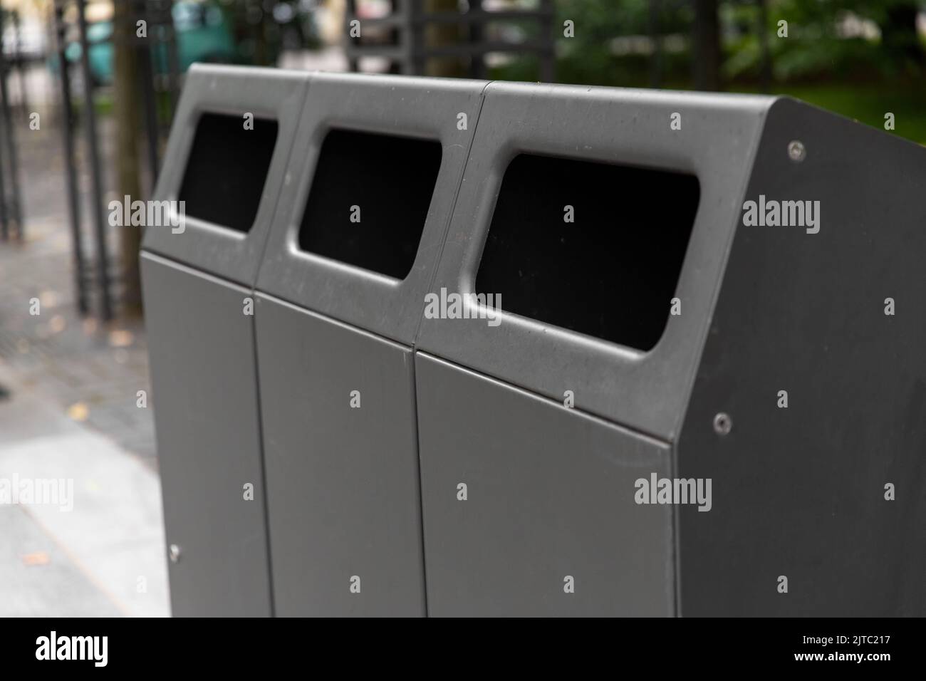 trash container on city street Stock Photo - Alamy