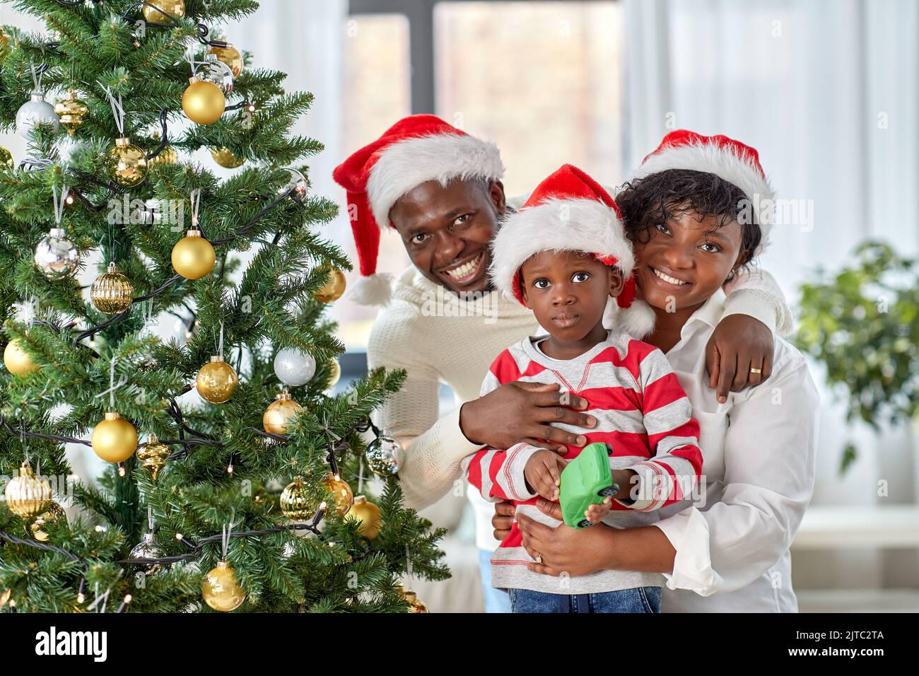 african family with toy cars at home on christmas Stock Photo - Alamy