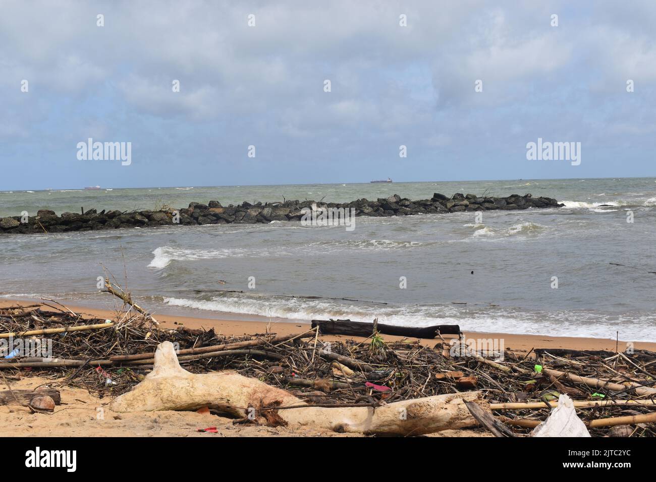 Wood and plastic wastage has washed ashore due to rough seas in the ...