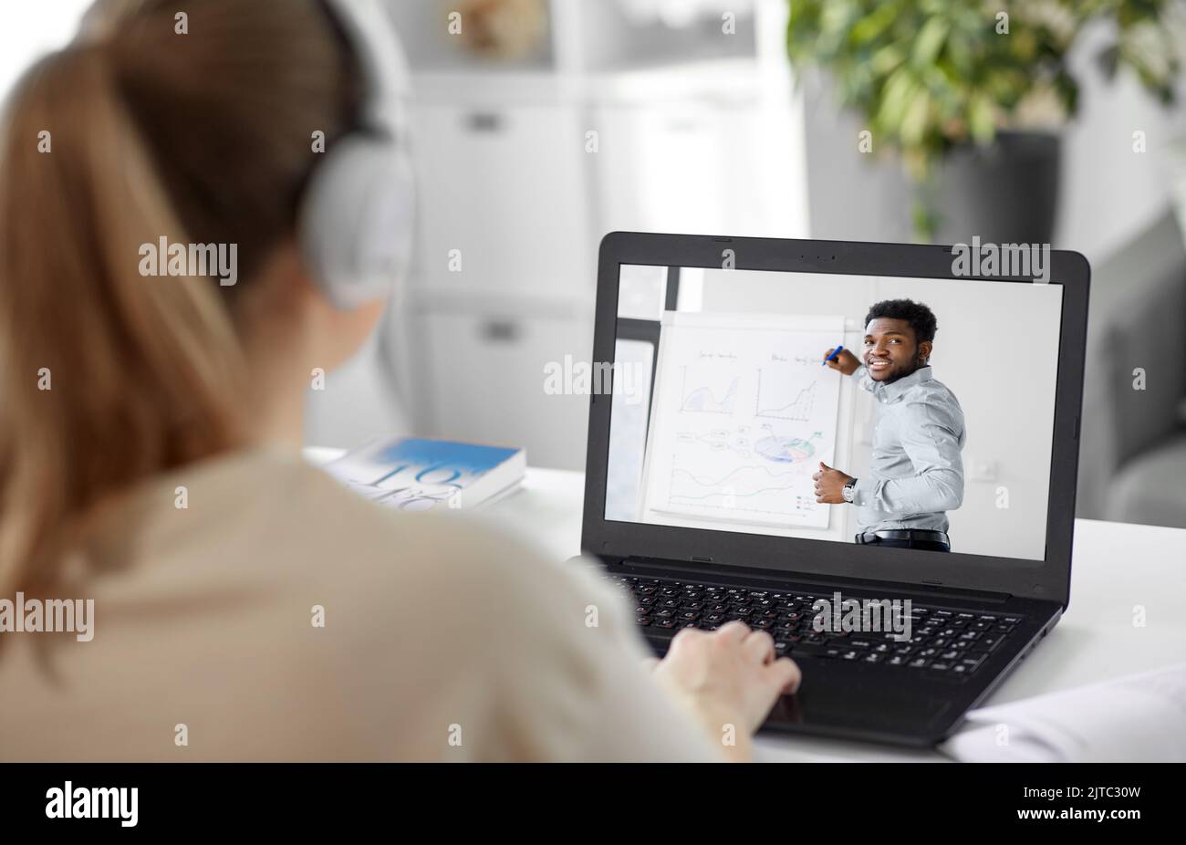Female student having online lesson hi-res stock photography and images ...