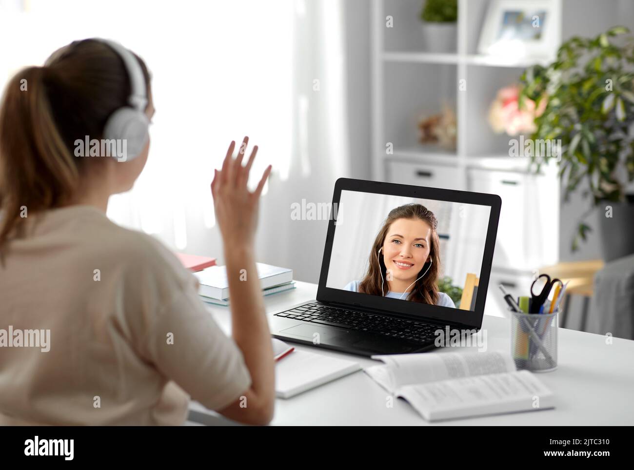 student with laptop having video call with teacher Stock Photo - Alamy