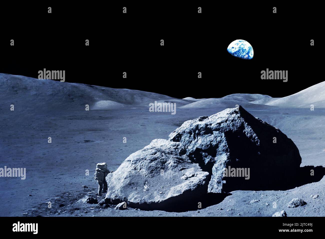 Little astronaut on the big moon. Elements of this image furnished by ...