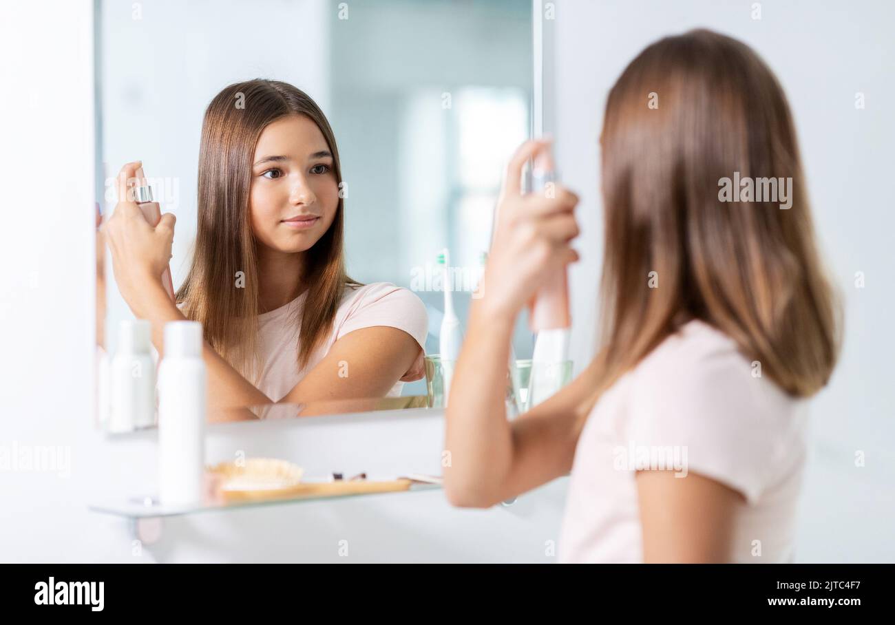 Using hair spray hi-res stock photography and images - Alamy
