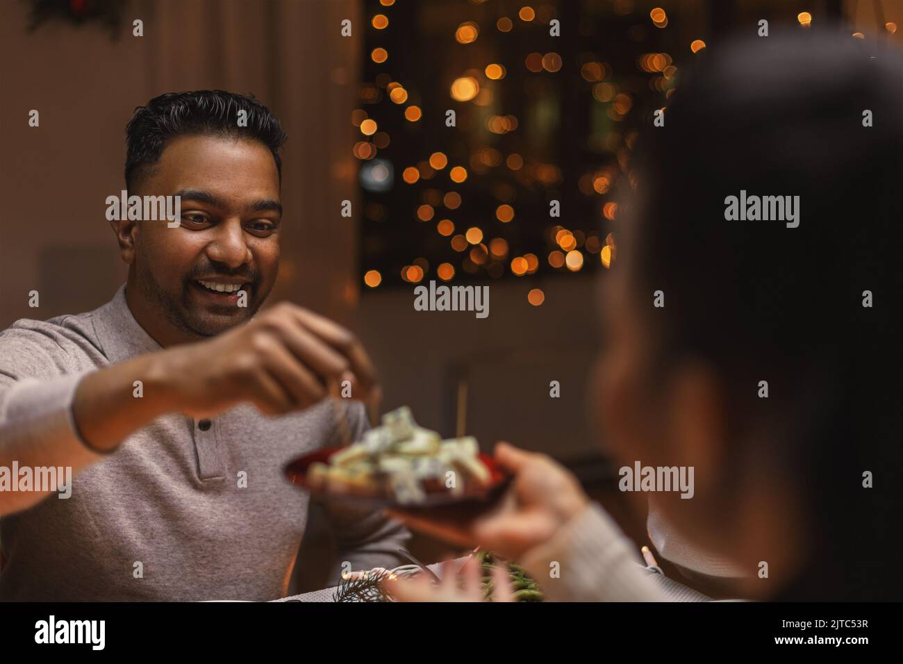 Indian family having dinner hi-res stock photography and images - Alamy