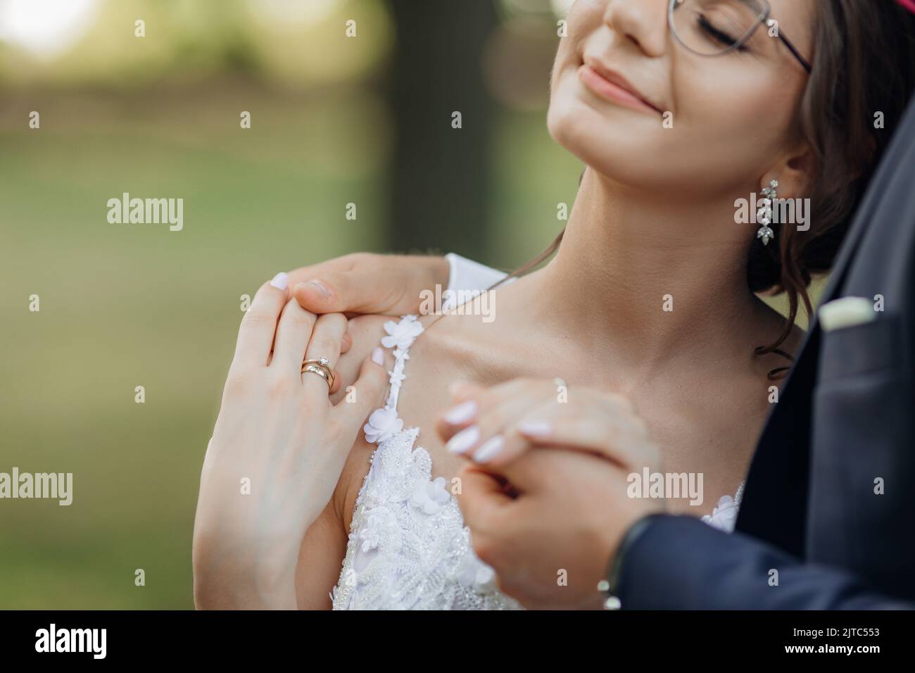 Close up cropped portrait affectionate, cheerful bride and groom caring ...