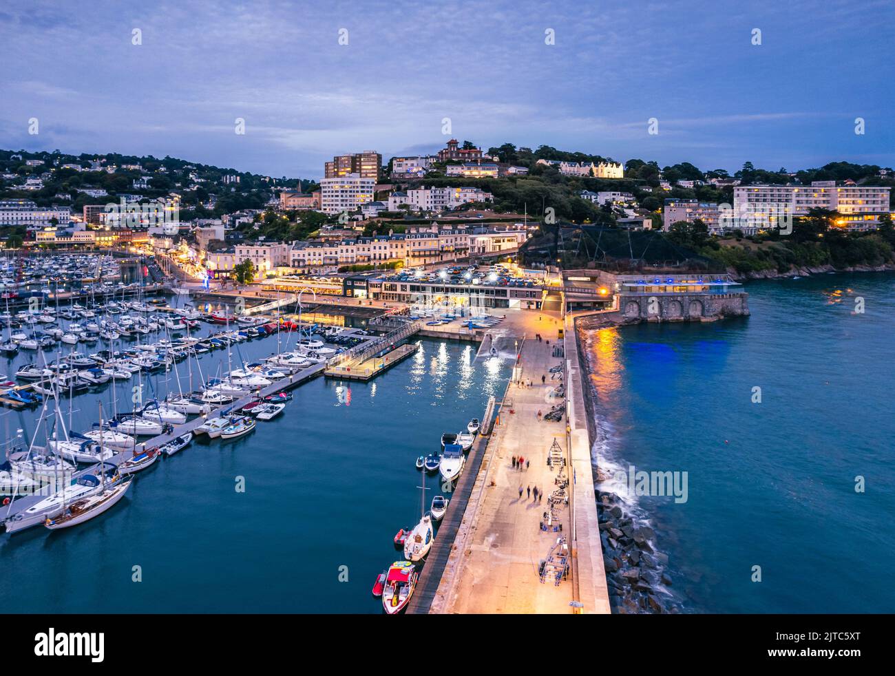 Sunset over Torquay Harbour and Marina, English Riviera from a drone ...