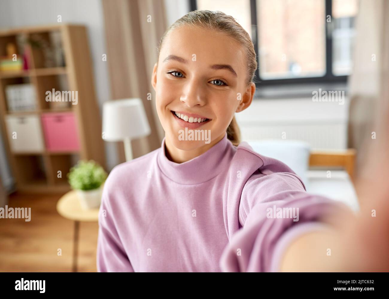 happy smiling girl taking selfie at home Stock Photo - Alamy happy smiling girl taking selfie at home Stock Photo - Alamy
