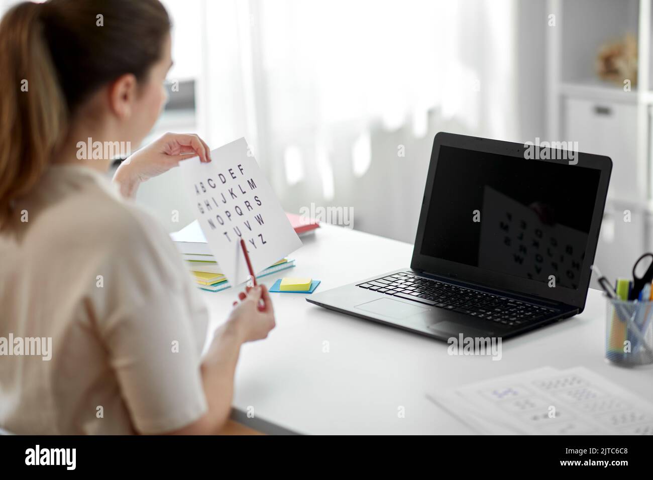 Teacher teaching alphabet hi-res stock photography and images - Alamy