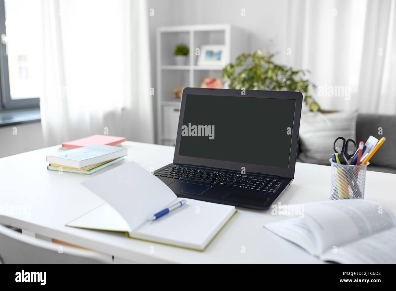 Open book laptop pen hi-res stock photography and images - Alamy